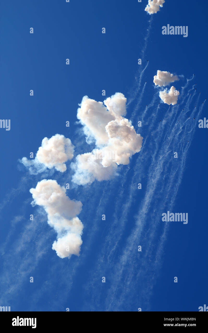 blue sky with fireworks firecrackers white clouds daytime Stock Photo ...