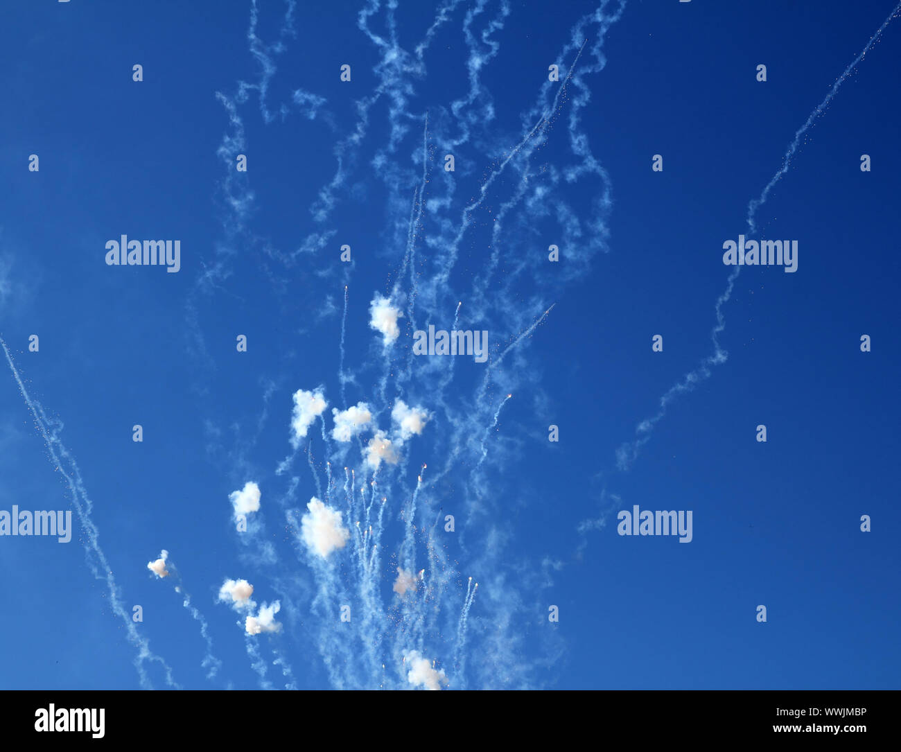 blue sky with fireworks firecrackers white clouds daytime Stock Photo ...