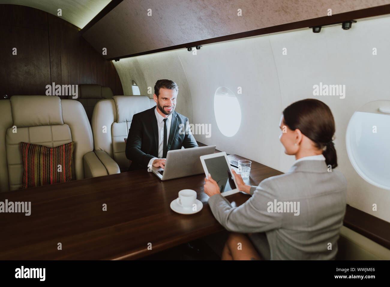 Business team on the private jet Stock Photo - Alamy