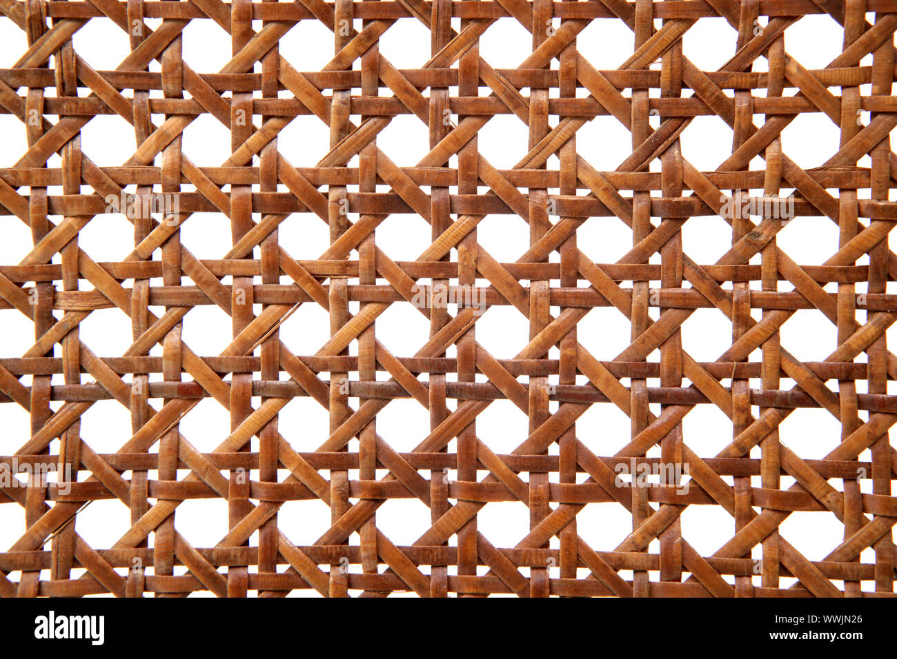 Rattan texture from thonet chair handcrafted in brown Stock Photo - Alamy