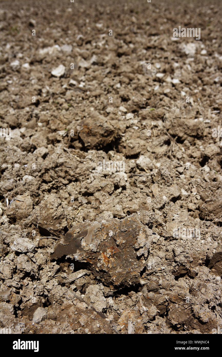 agriculture plough plow clay dark brown soil perspective Stock Photo ...