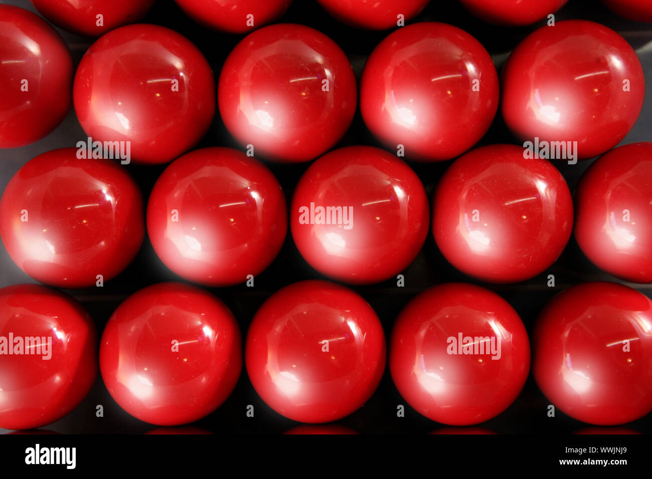Billiard many red balls rows background pattern texture Stock Photo - Alamy
