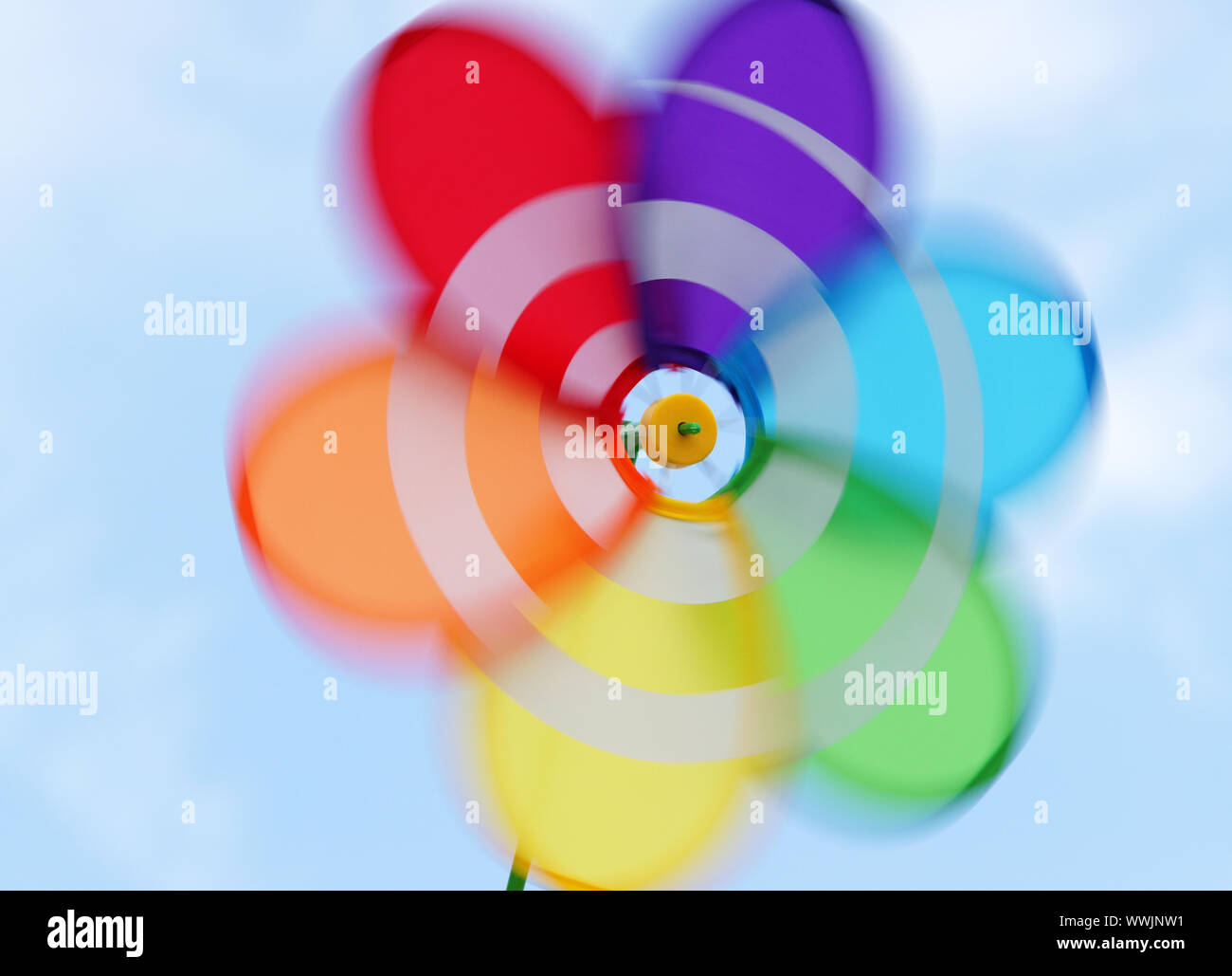 Rotating windmill with blue sky Stock Photo - Alamy