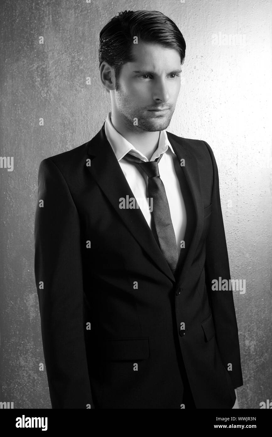 Classic elegant black and white suit handsome man portrait Stock Photo ...