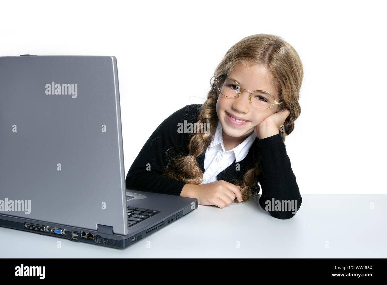little blond student school girl with laptop computer on white ...