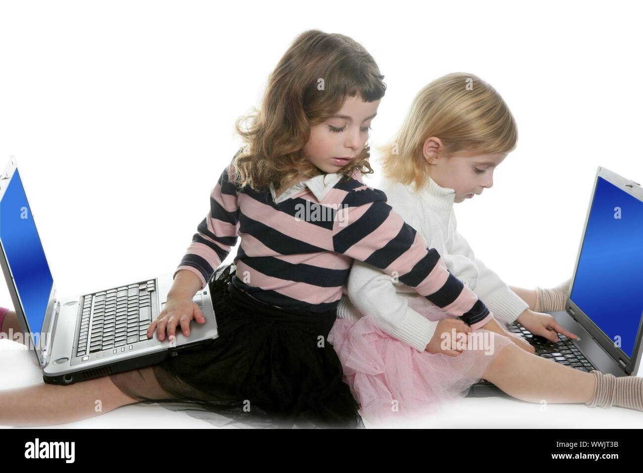 two little girls sister studying computer laptops at school Stock Photo ...