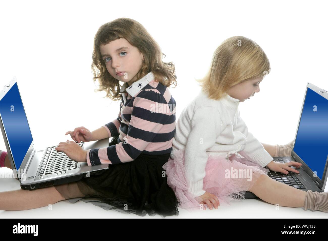 two little girls sister studying computer laptops at school Stock Photo ...