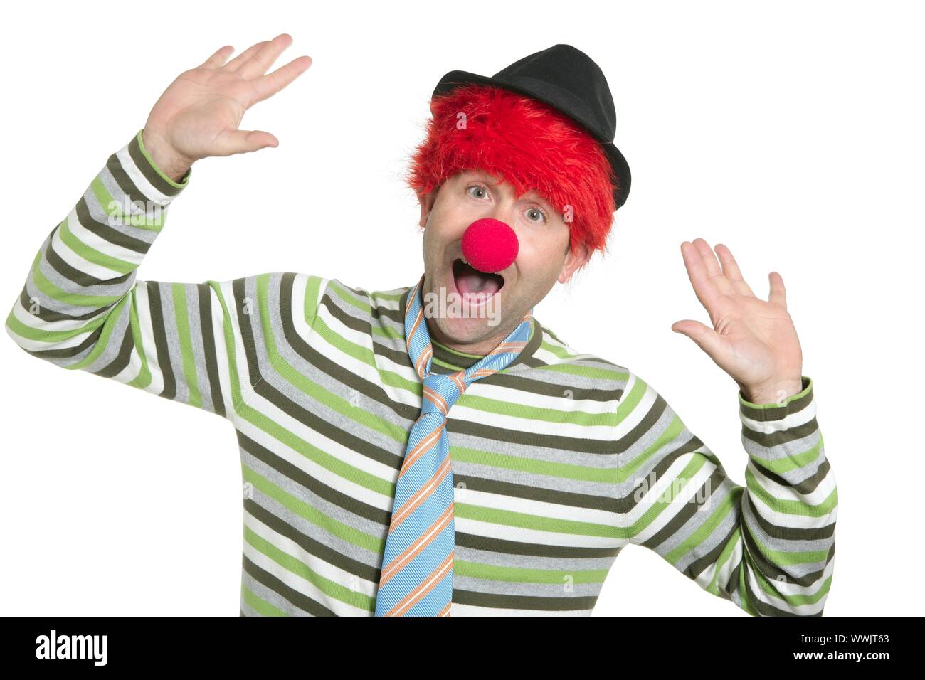 Clown redhead wig happy funny gesture open hands Stock Photo - Alamy