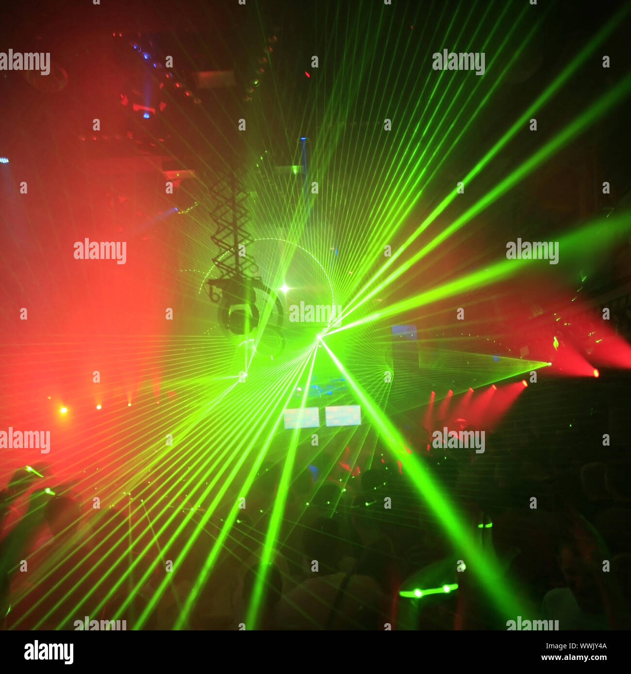 Colored laser party in entertainment disco club Stock Photo - Alamy