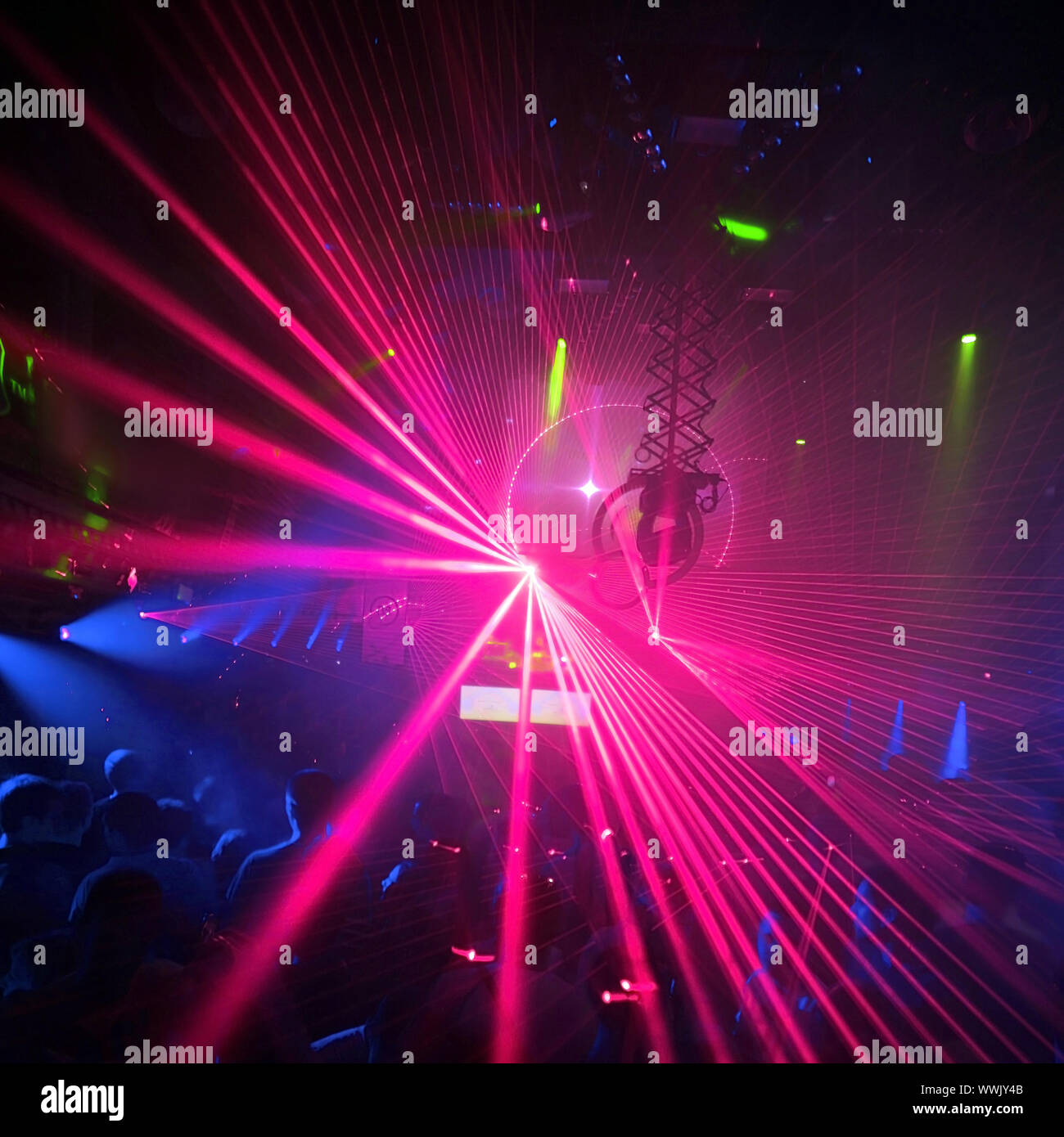 Colored laser party in entertainment disco club Stock Photo - Alamy