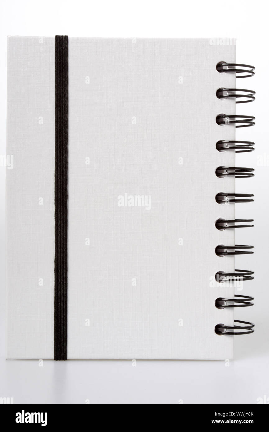 White notebook with black ring binders, isolated on white, black string ...