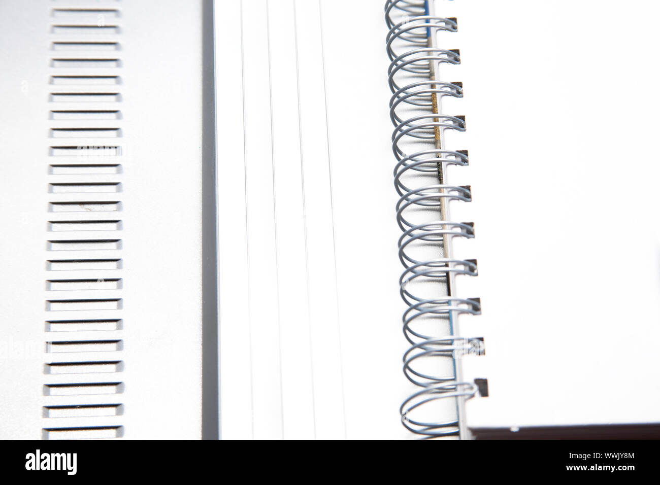 Address book with metal spiral, white paper Stock Photo - Alamy