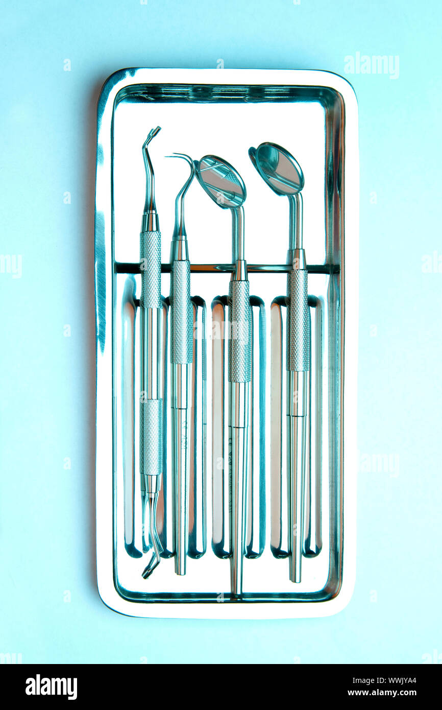 Dental Instruments - angled mirrors, plate, tools Stock Photo - Alamy