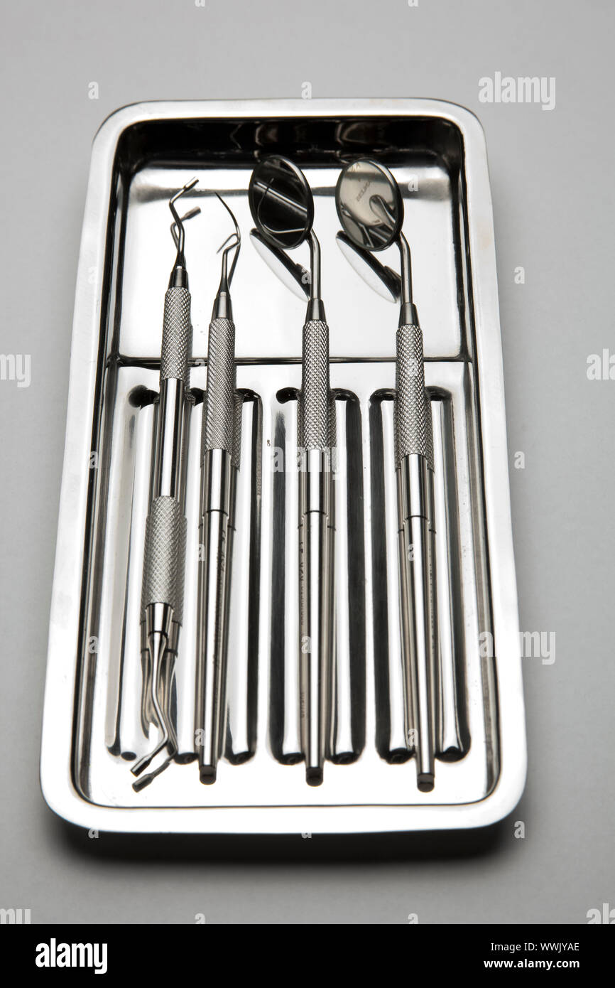 Dental Instruments - angled mirrors, plate, tools Stock Photo - Alamy