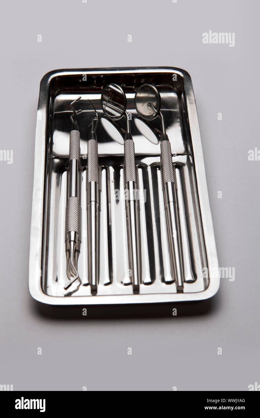 Dental Instruments - angled mirrors, plate, tools Stock Photo - Alamy
