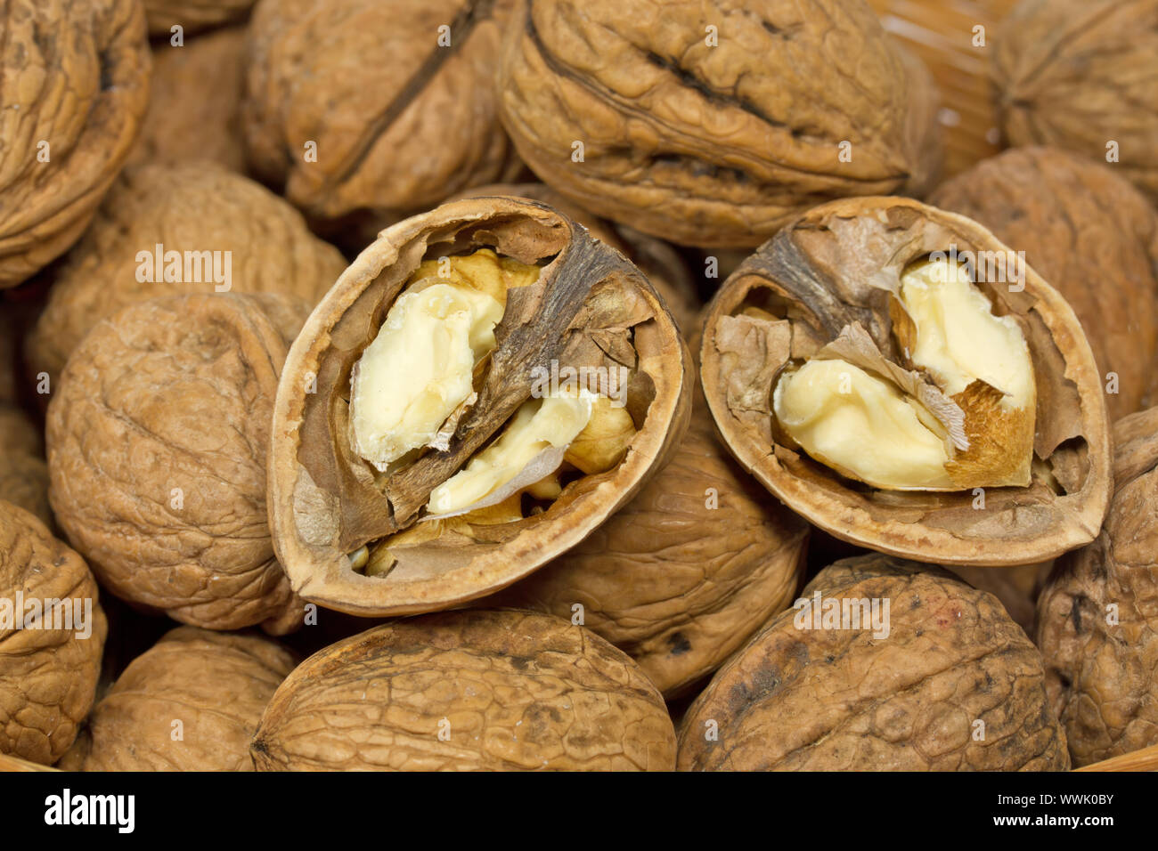 Walnuts, full size, as background Stock Photo - Alamy