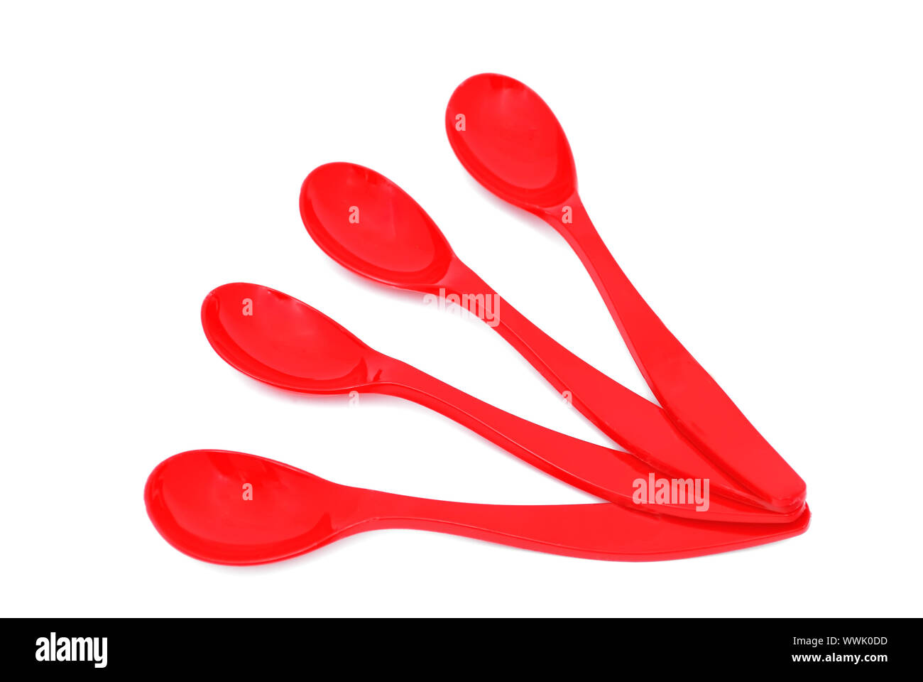 four children's spoons laid out like a fan on a white background Stock ...