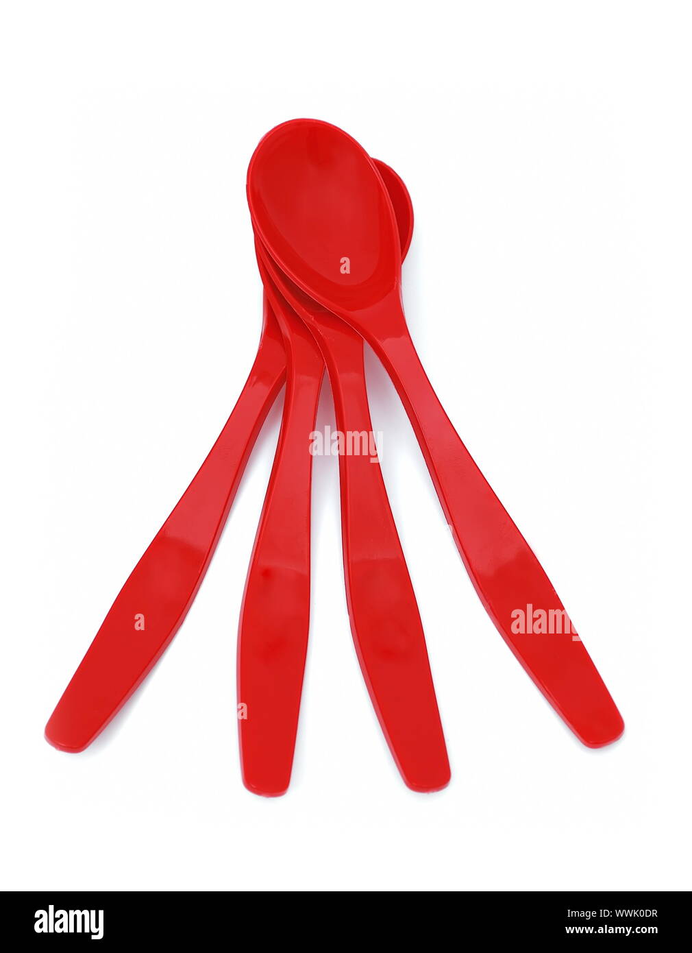 four children's spoons laid out like a fan on a white background Stock ...