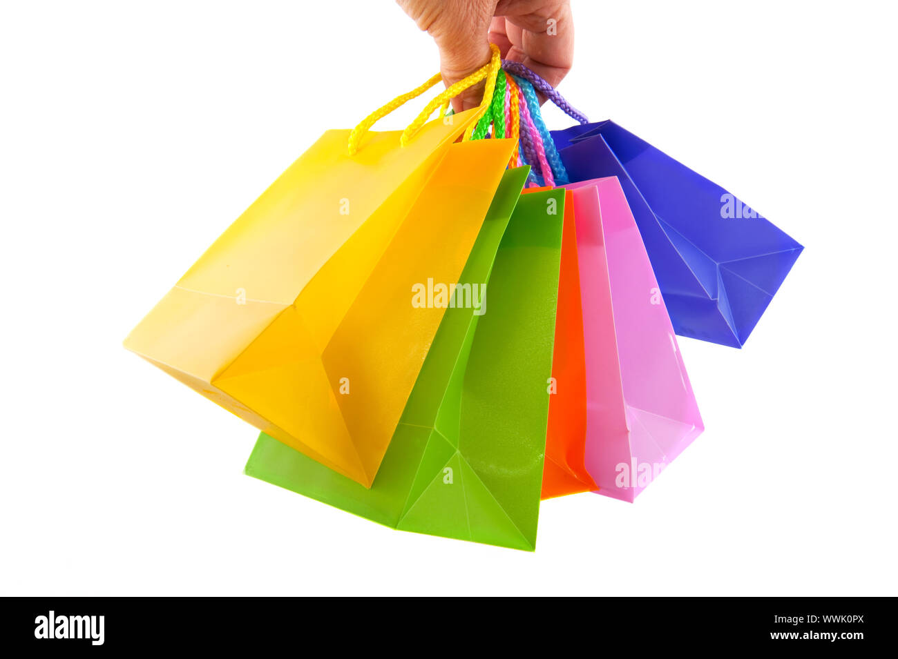 shopping with many colorful bags in the hand Stock Photo - Alamy