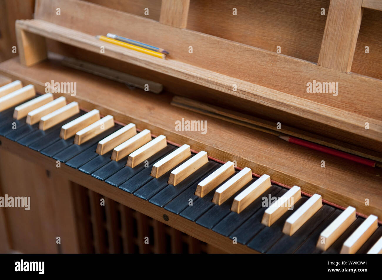 wooden church organ with black dark keyboard Stock Photo - Alamy