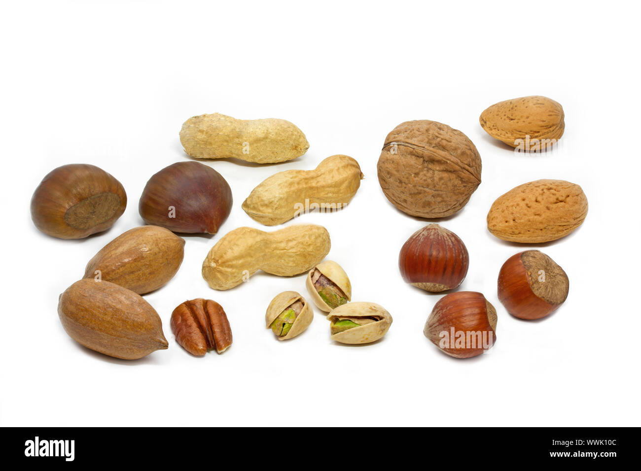 Selection of nuts on white background Stock Photo - Alamy