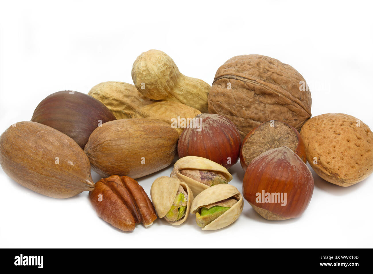 Selection of nuts on white background Stock Photo - Alamy