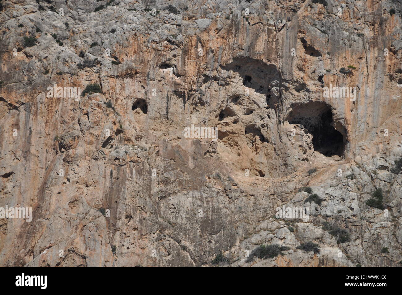 cave in a rock face Stock Photo - Alamy