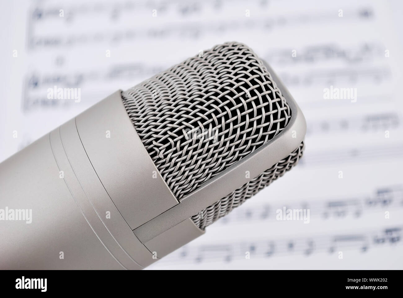 professional microphone and musical notes Stock Photo - Alamy