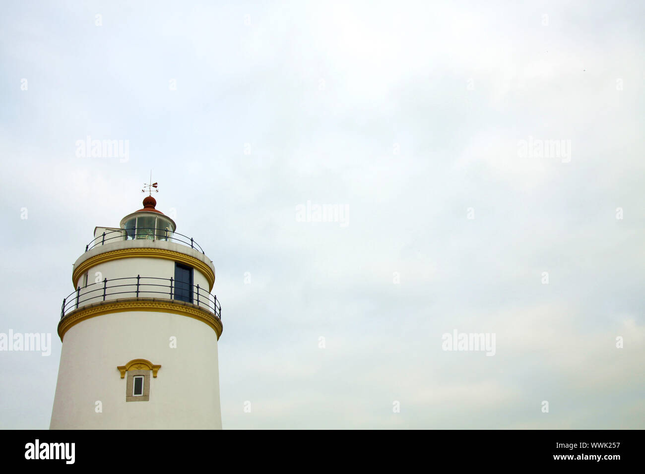 The Guia Fortress white tower in Macau Stock Photo - Alamy