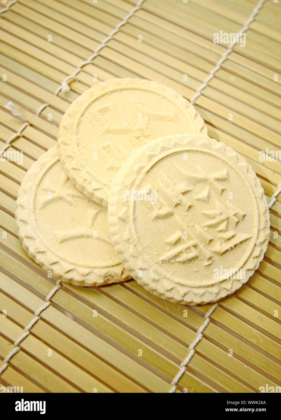 Rice biscuits on bamboo plate Stock Photo - Alamy