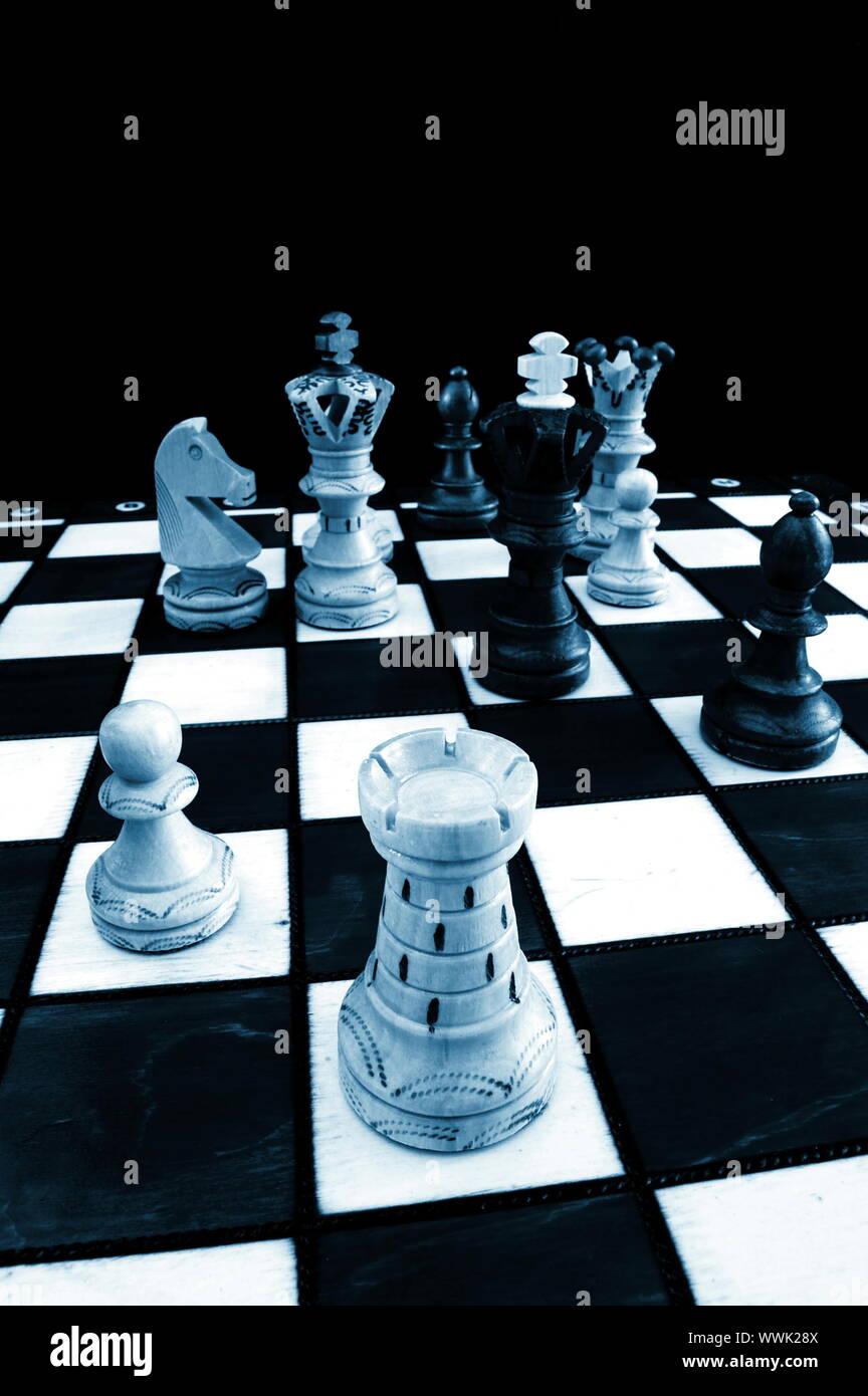 chess pieces on chess board showing competition success and strategy in ...