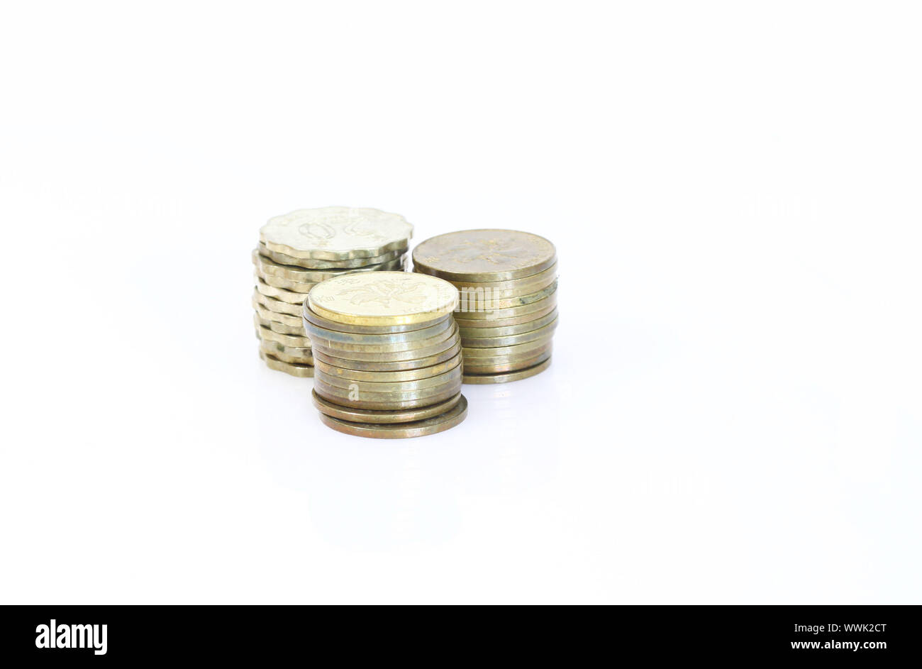 Stack of coins isolated on white background Stock Photo - Alamy