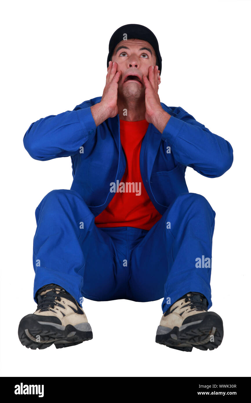 A crying handyman Stock Photo - Alamy