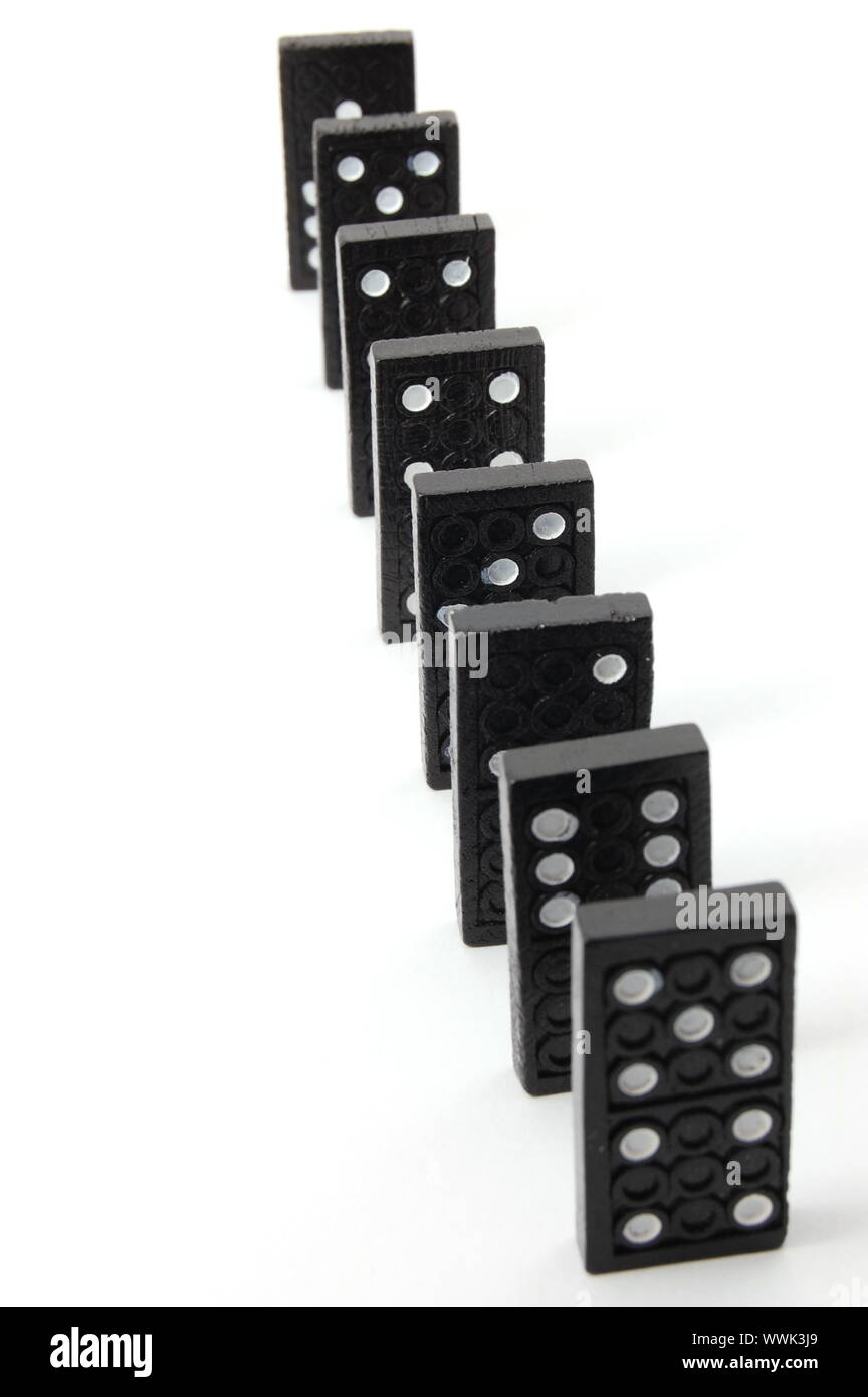 chain of dominoes isolated on a white background Stock Photo - Alamy