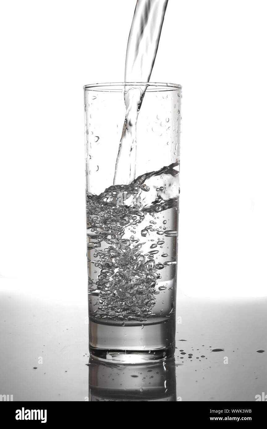 glass of pouring fresh and cold water Stock Photo - Alamy