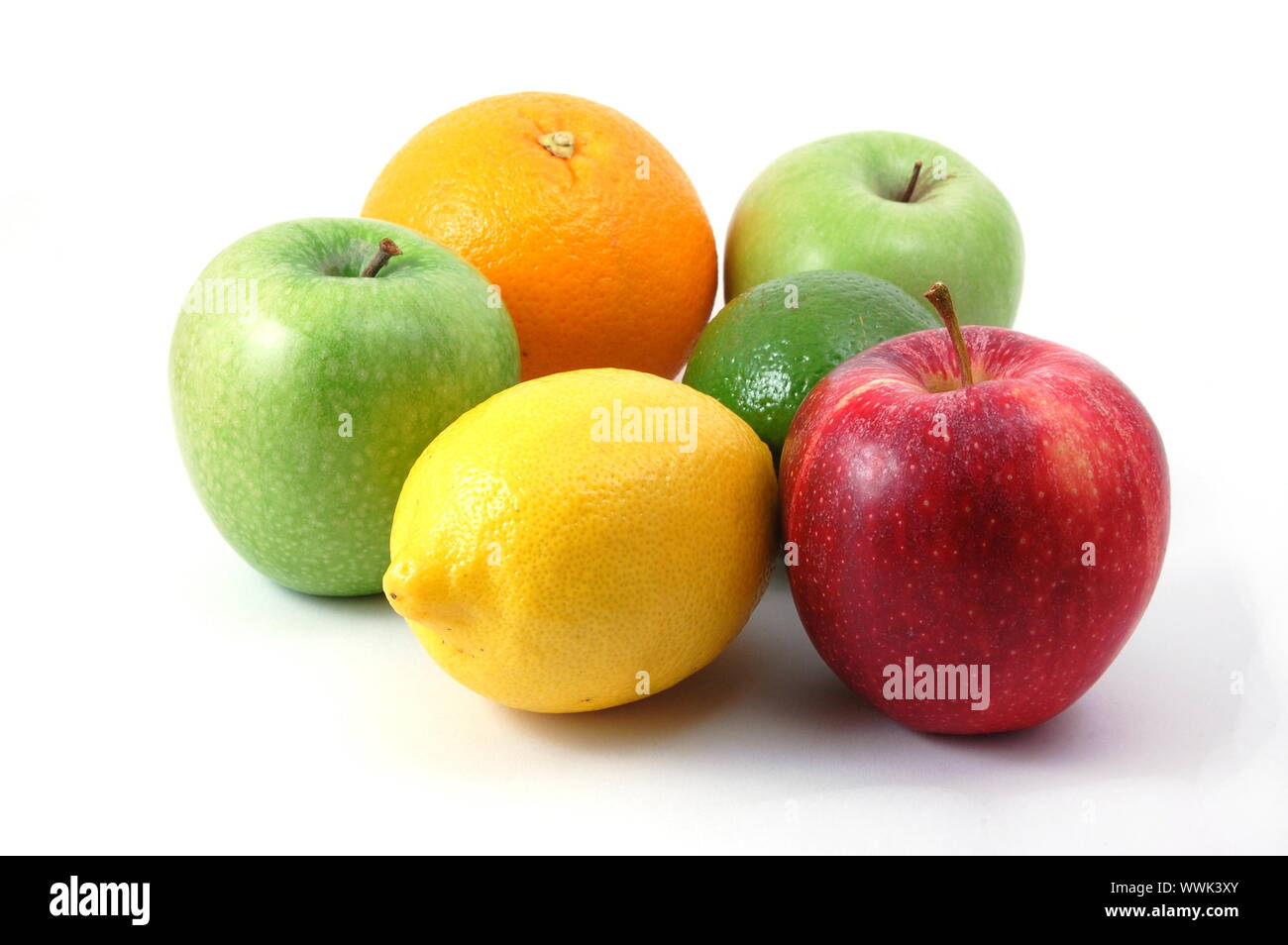 fruits like apple , lemon , citron orange and lime isolated on a white ...