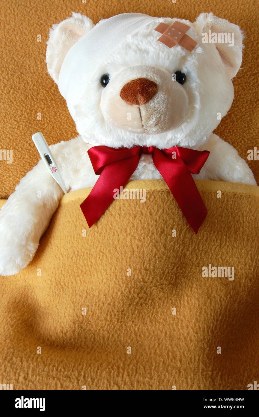 sick teddy bear in bed waiting for the doctor Stock Photo - Alamy