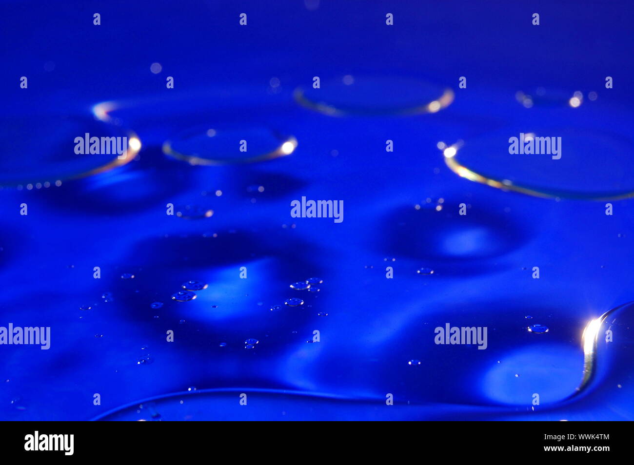 strange and abstract blue water bubble background Stock Photo - Alamy