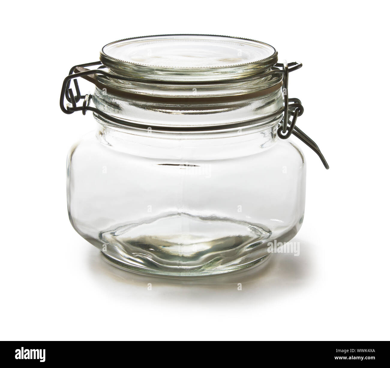 an empty glass jar on white background Stock Photo - Alamy