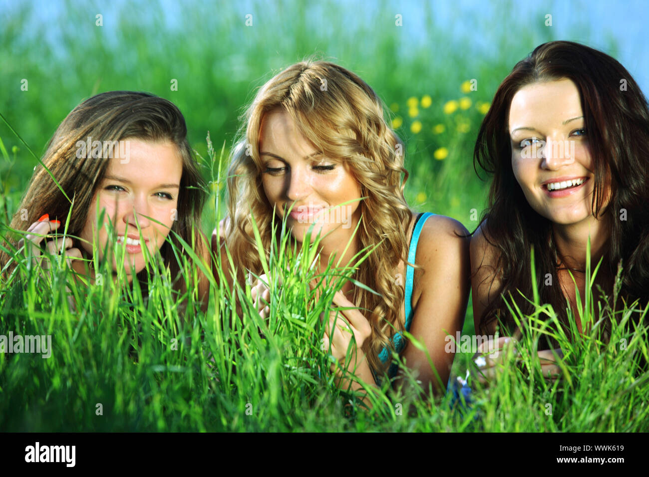 women fun on grass field Stock Photo - Alamy