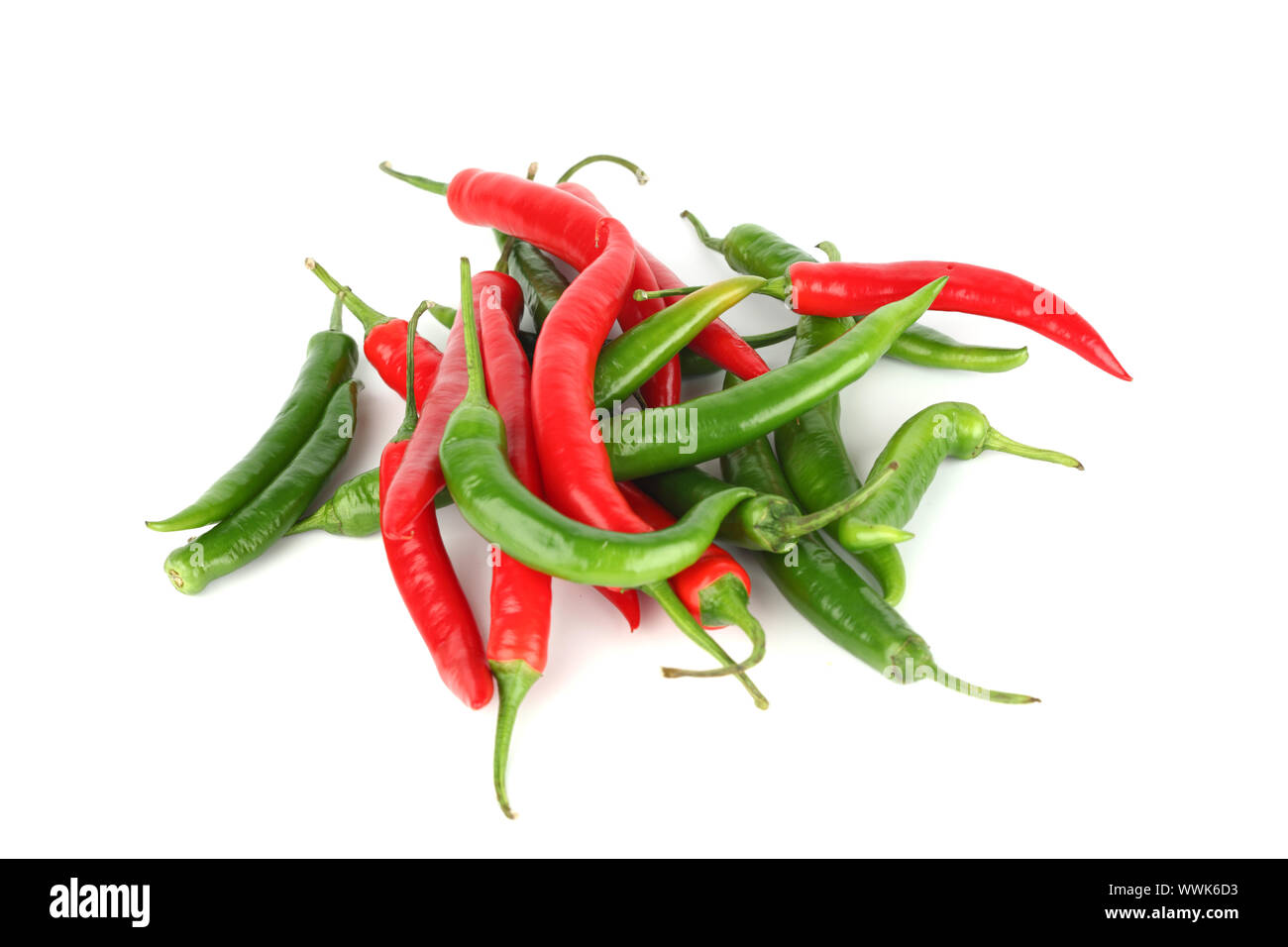 mixed chilli pile isolated on white Stock Photo - Alamy