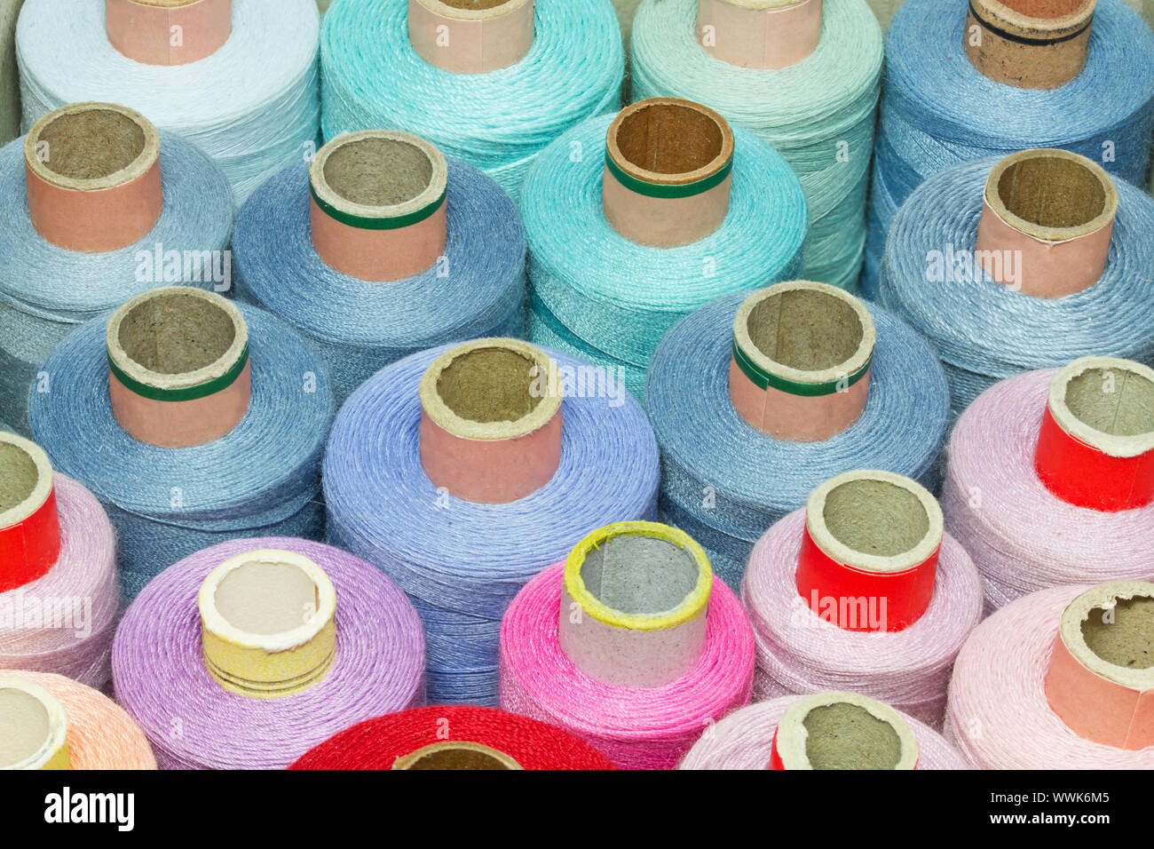 Coloured yarn reels Stock Photo - Alamy