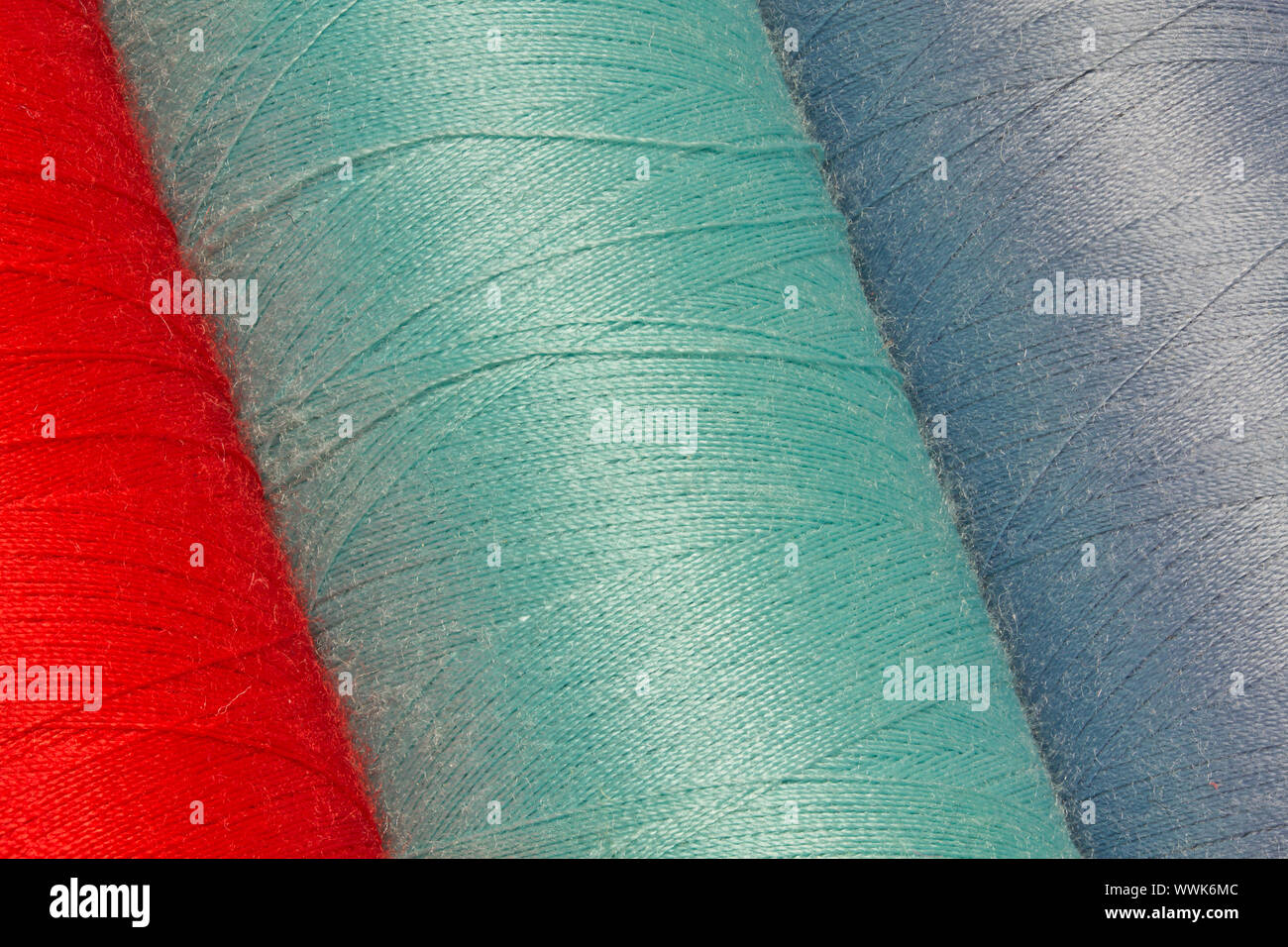 Coloured yarn reels Stock Photo - Alamy