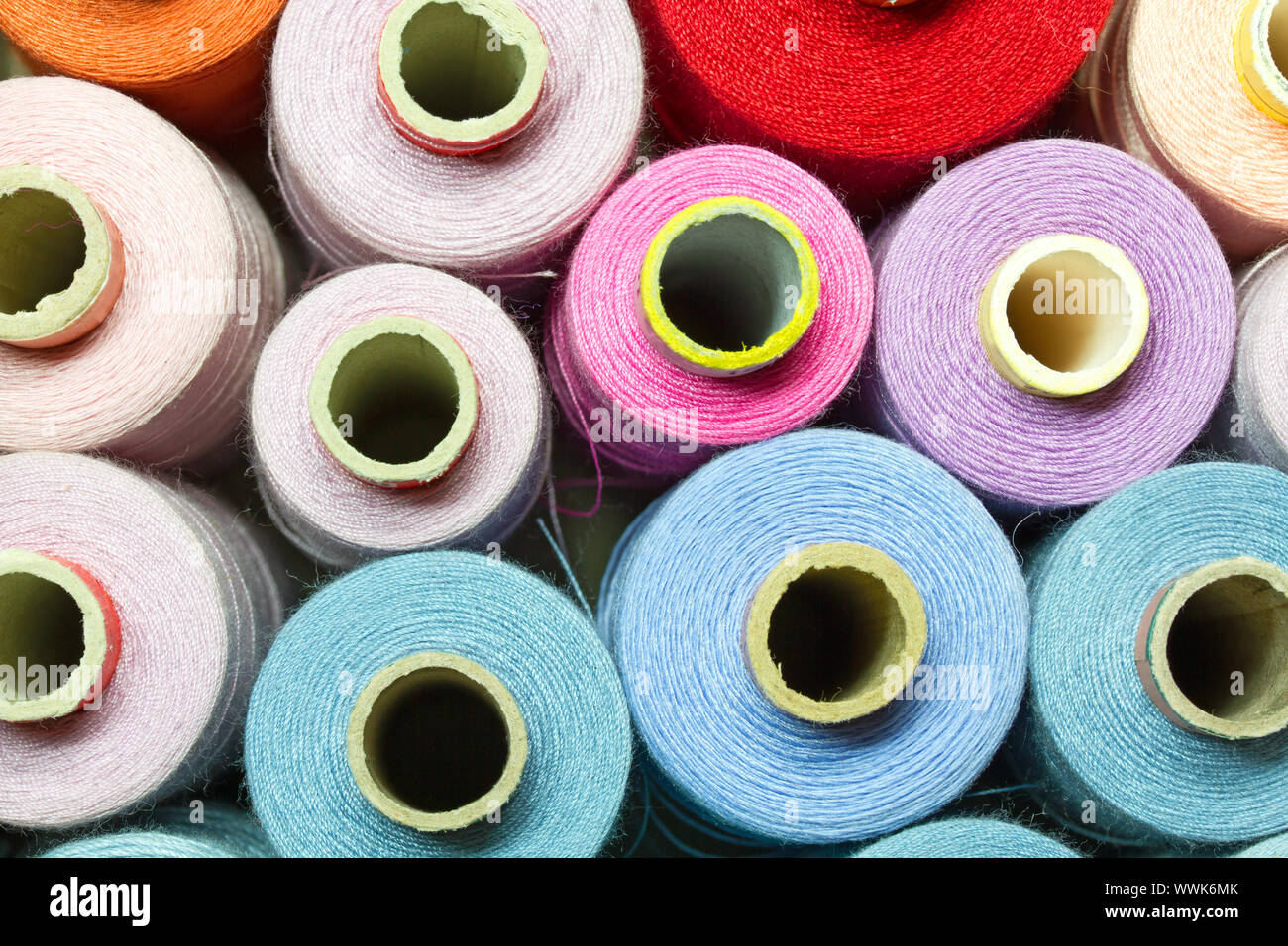 Coloured yarn reels Stock Photo - Alamy
