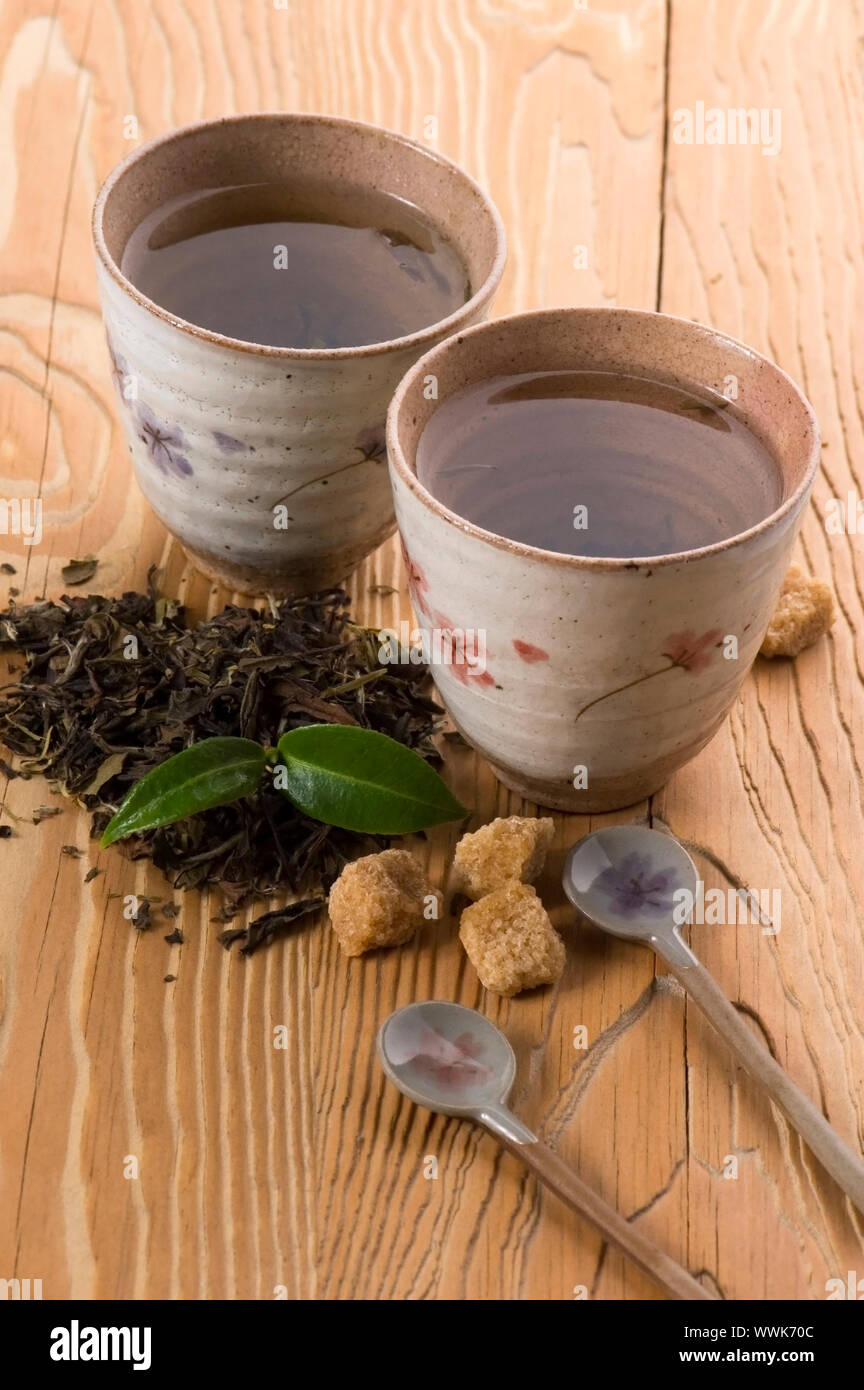 green tea with fresh branch Stock Photo - Alamy
