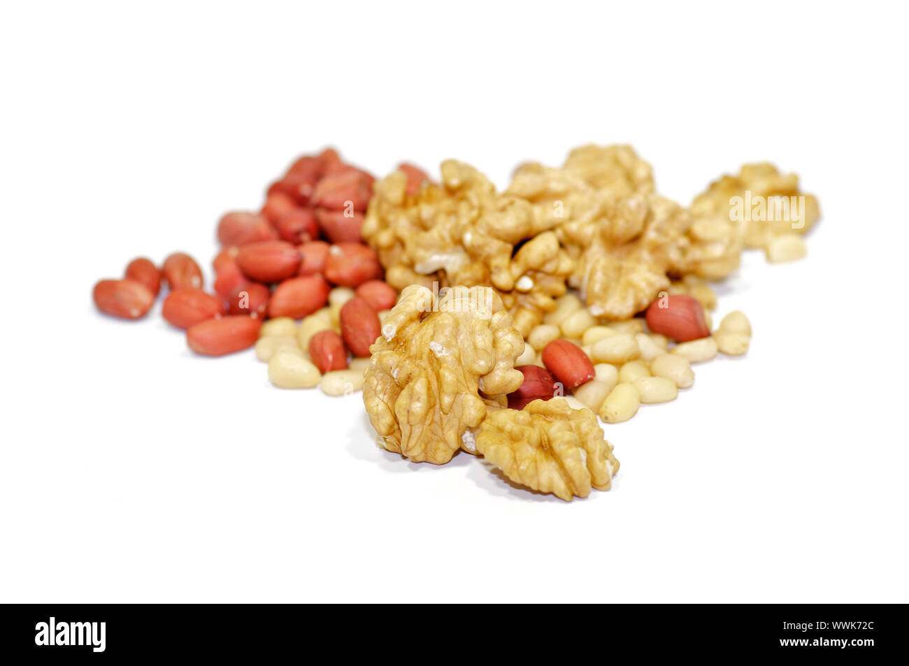 Walnuts, peanut and pine nut isolated on white background Stock Photo ...