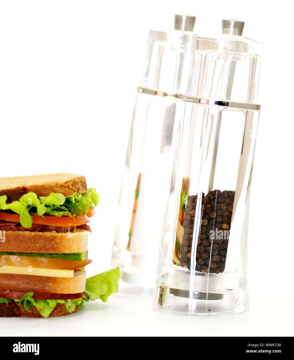Classical BLT Club Sandwich with Saltcellar and pepperbox isolated on ...