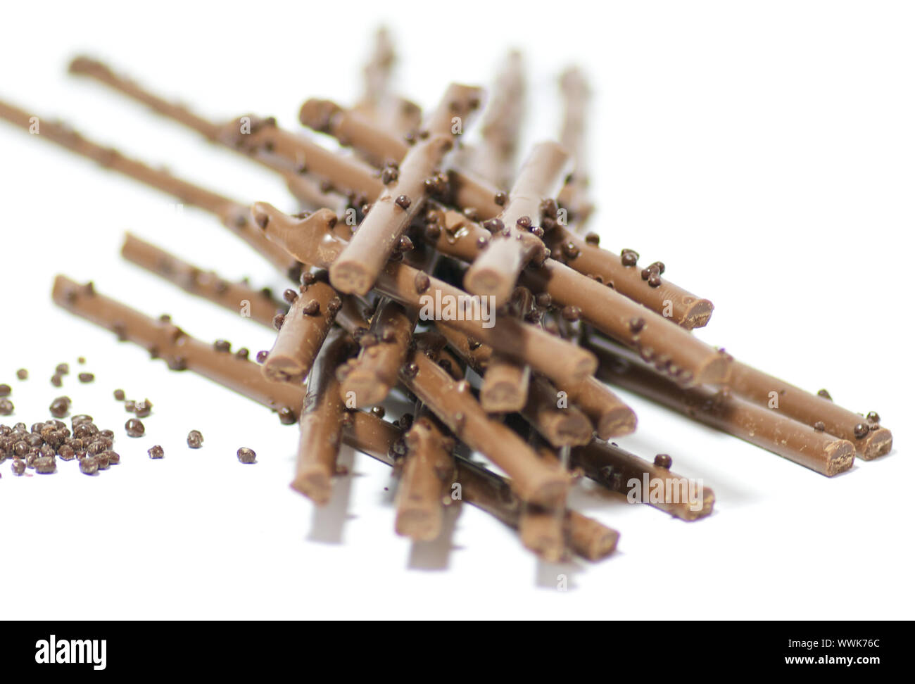Chocolate sticks with chocolate granules isolated on white background ...