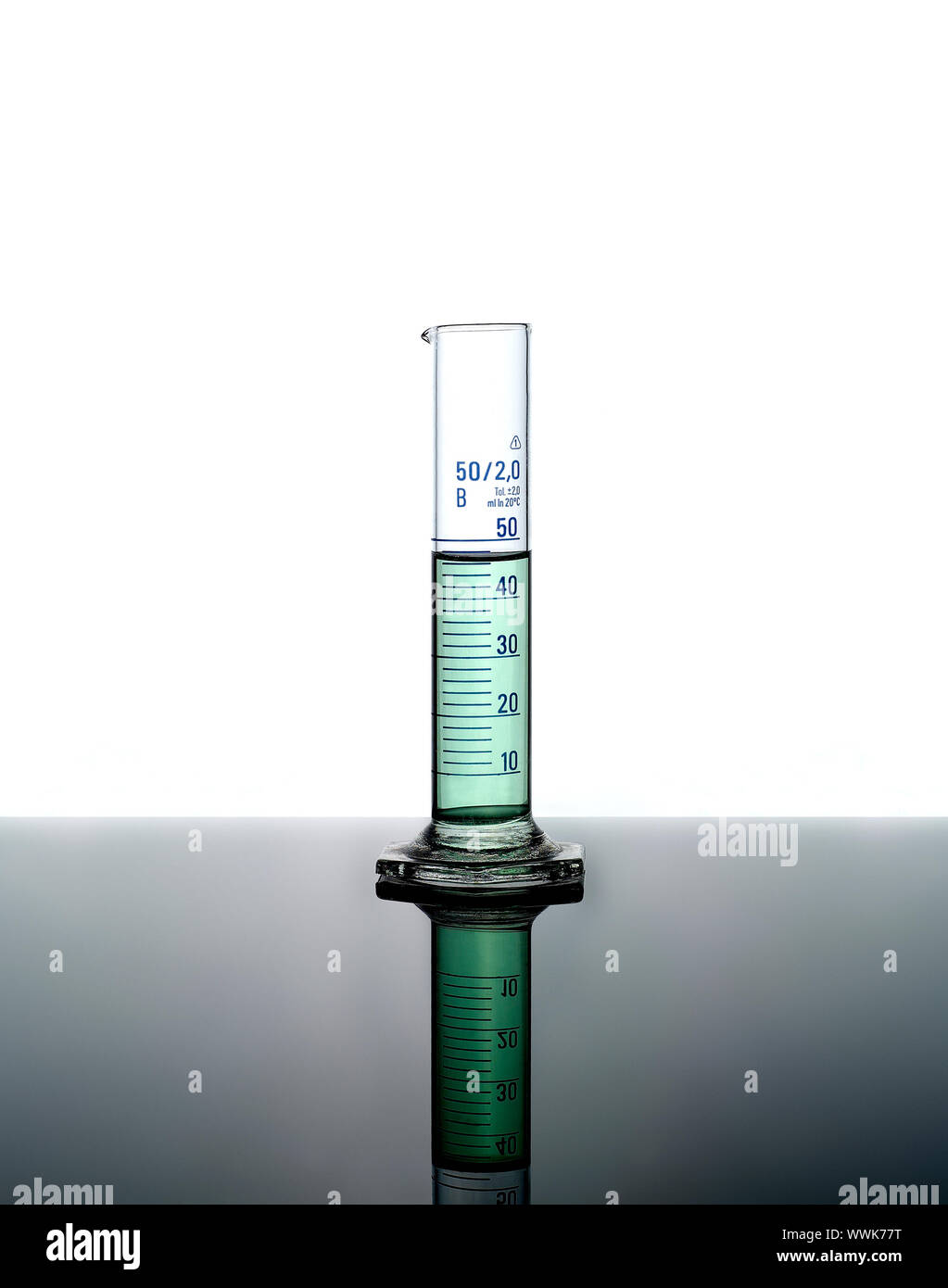 Laboratory Glass with green liquid Stock Photo - Alamy