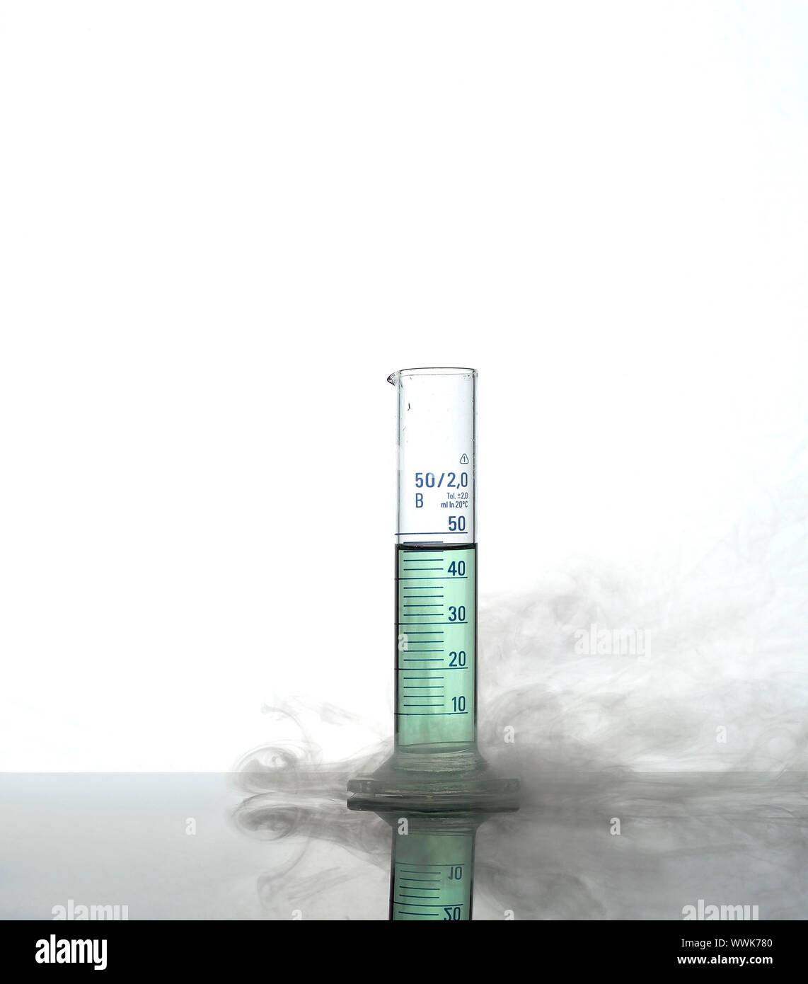 Laboratory Glass with green liquid Stock Photo - Alamy